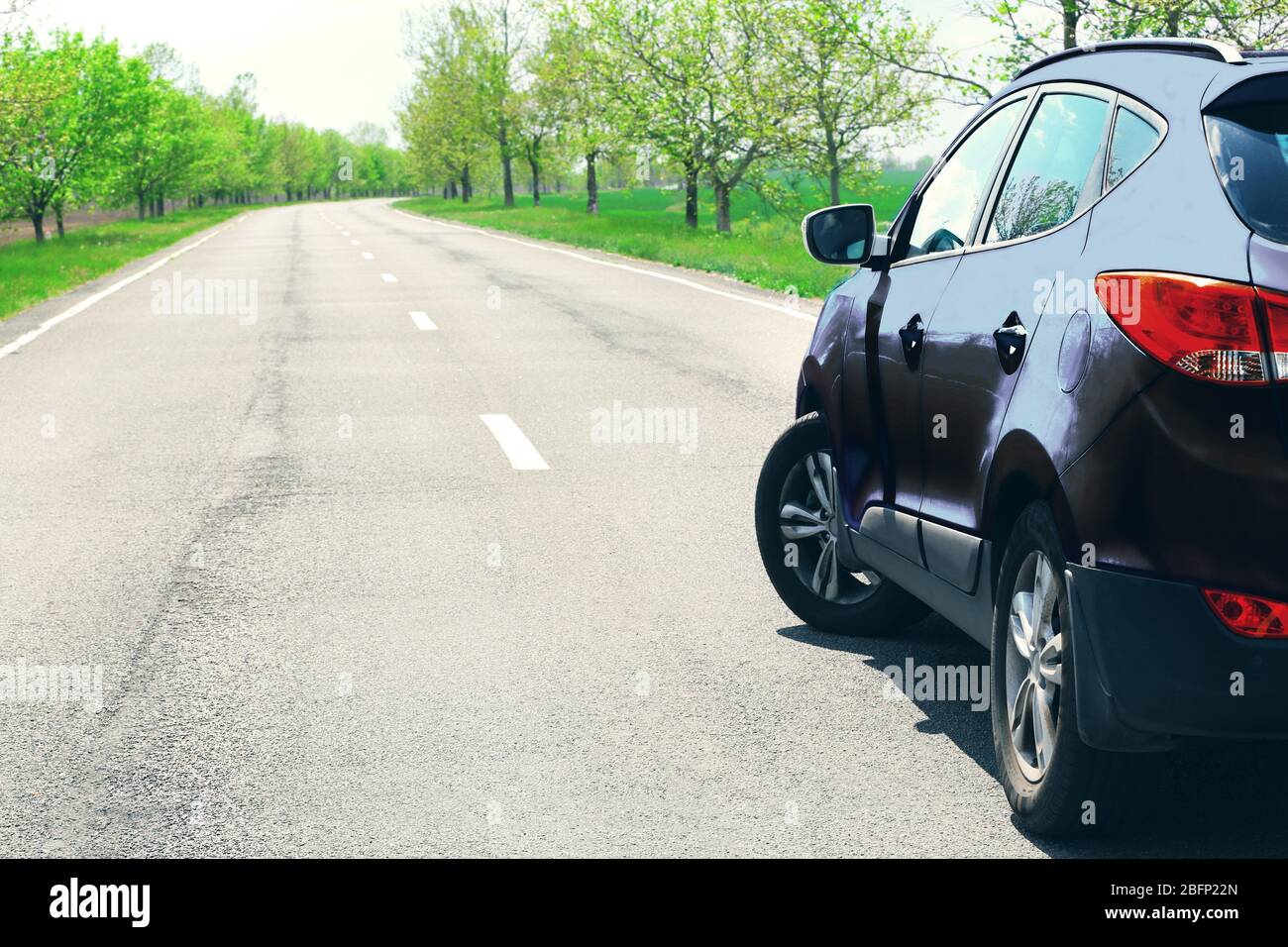 Car on road Stock Photo - Alamy