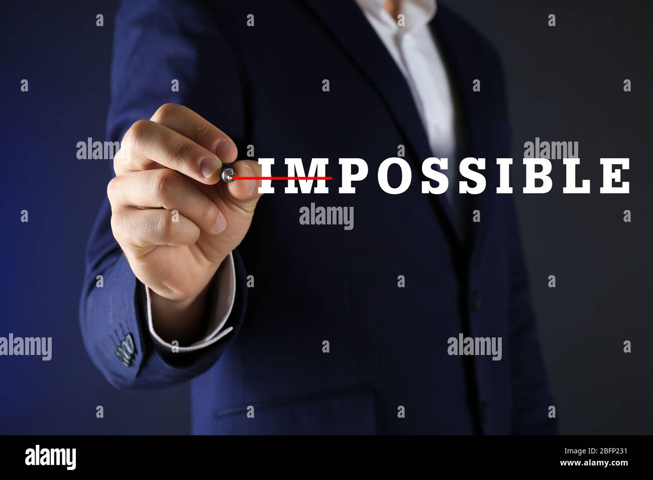 Human hand turning word impossible into possible Stock Photo - Alamy