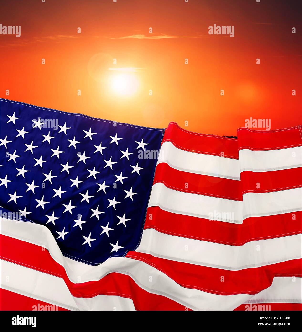 Flag of United States of America on sunset background Stock Photo - Alamy