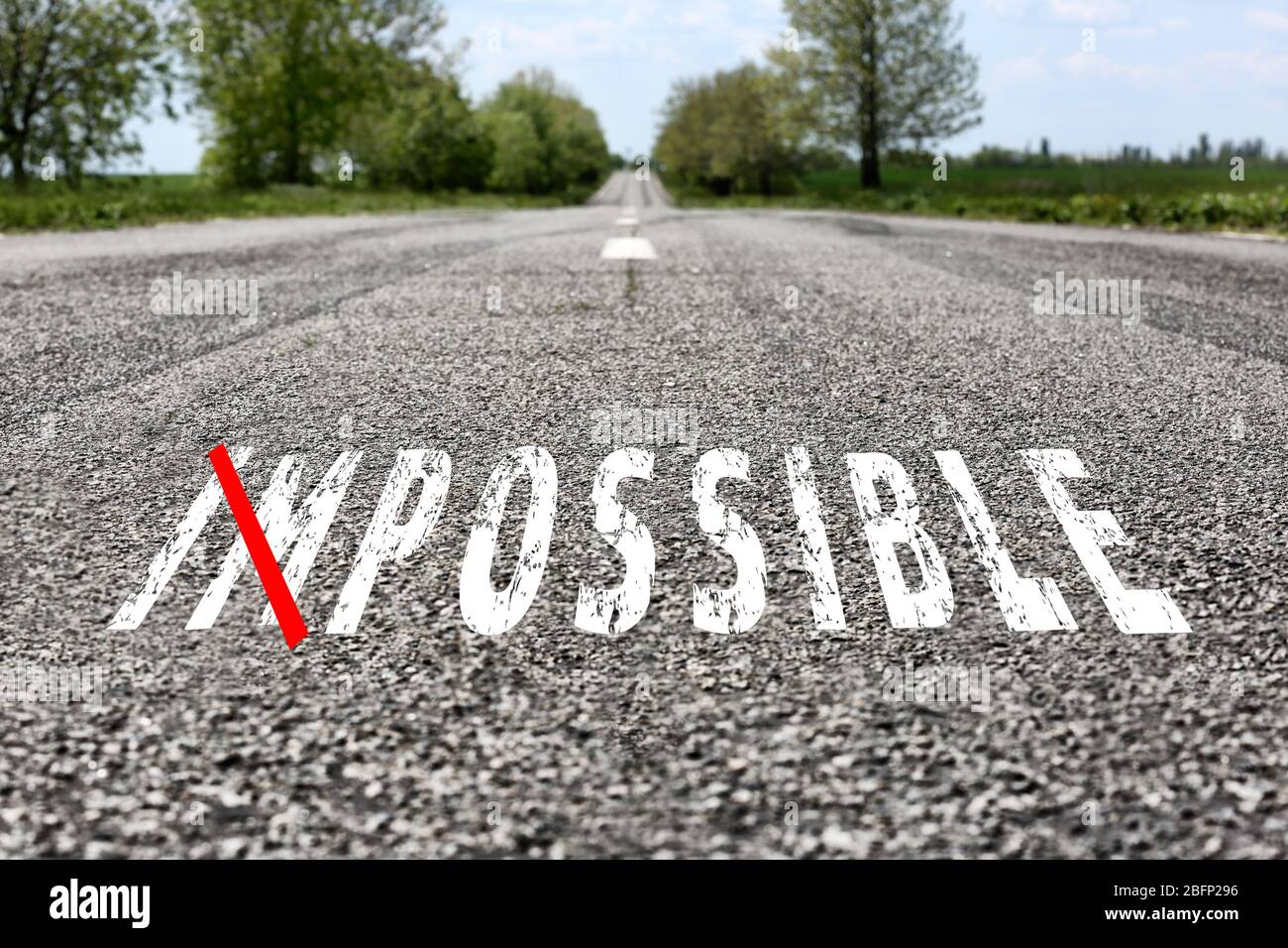 Changing the word impossible to possible on asphalt road Stock Photo ...