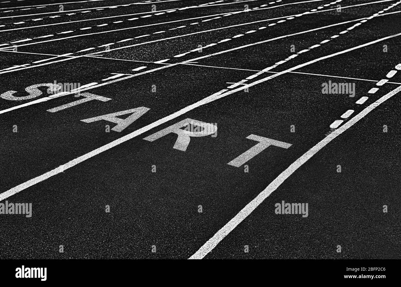 Start written on running track Stock Photo - Alamy