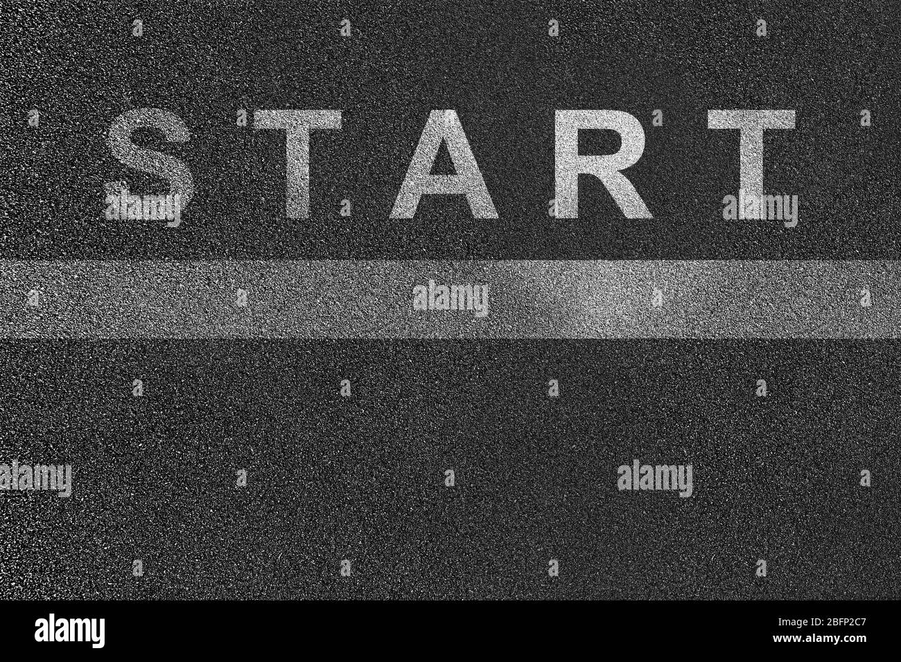 Start written on running track Stock Photo - Alamy