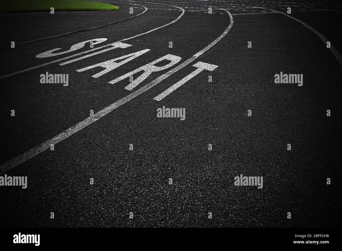Start written on running track Stock Photo - Alamy