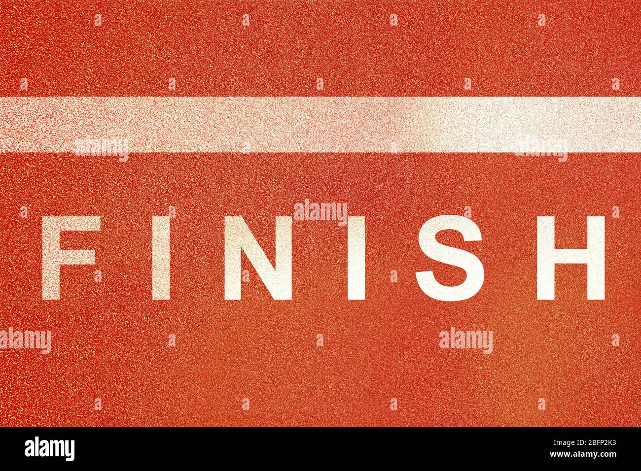 Finish written on running track Stock Photo - Alamy