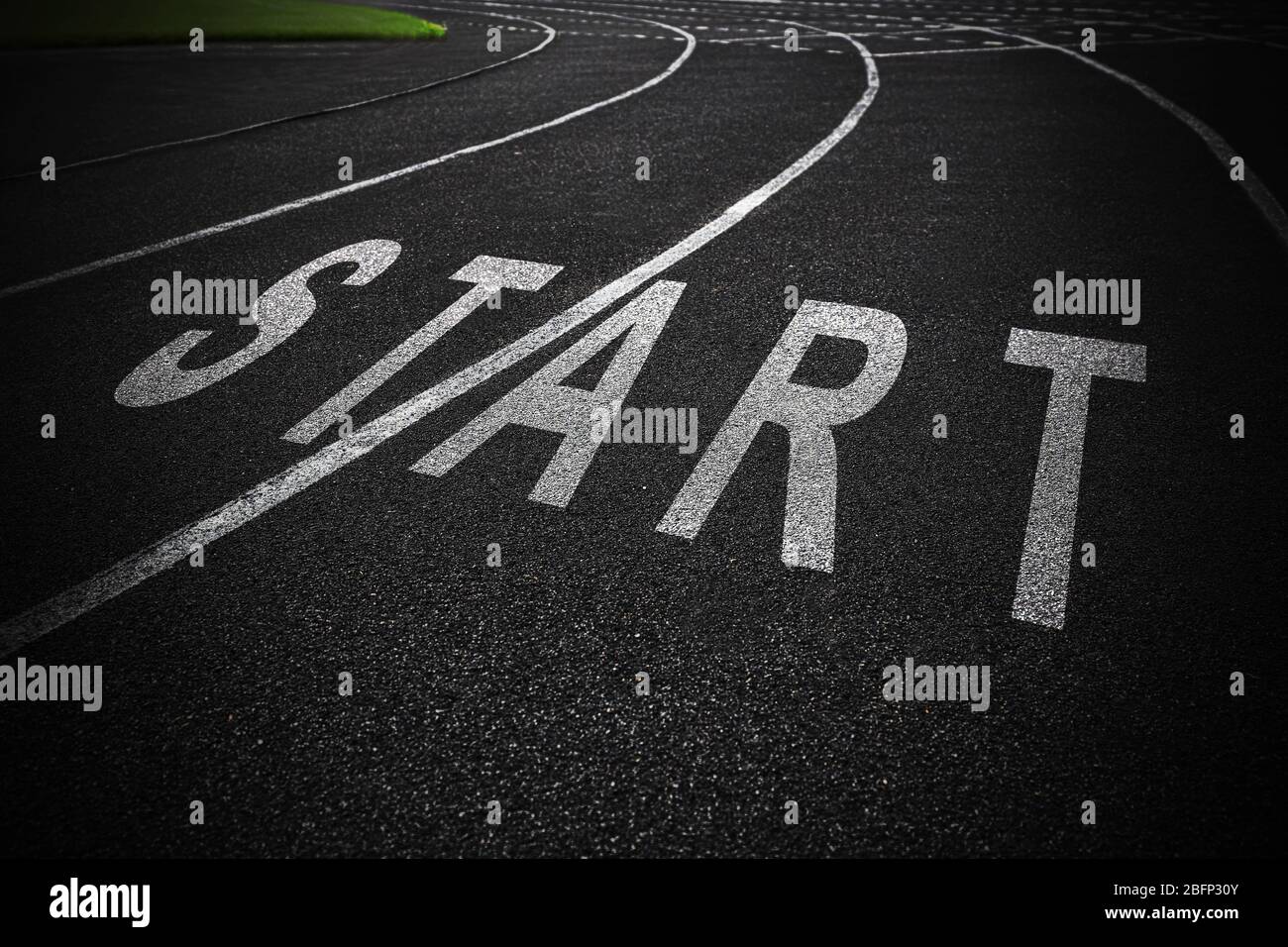 Start written on running track Stock Photo - Alamy