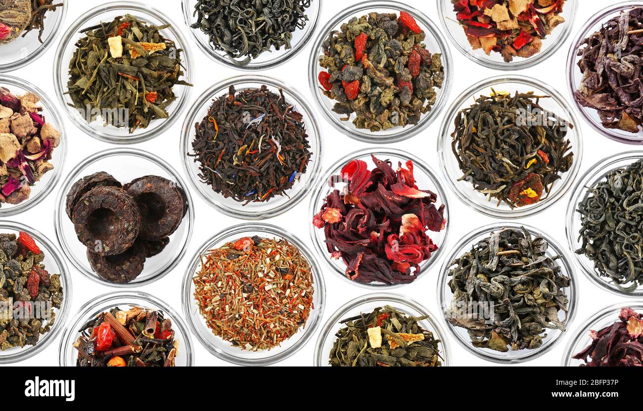 Set of different tea in bowls on white background Stock Photo - Alamy