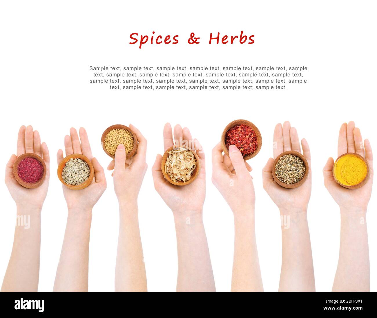 Hands holding collection of different spices in wooden bowls, isolated ...