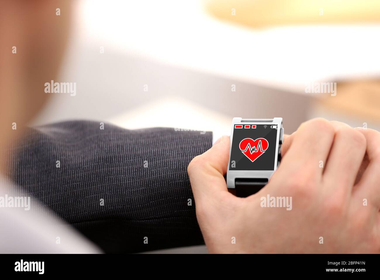 Man wearing suit smartwatch hi-res stock photography and images - Alamy