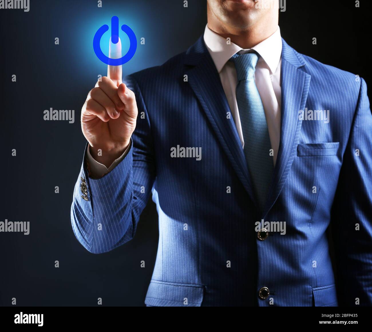 Finger press power button on virtual touch screen, modern technology ...