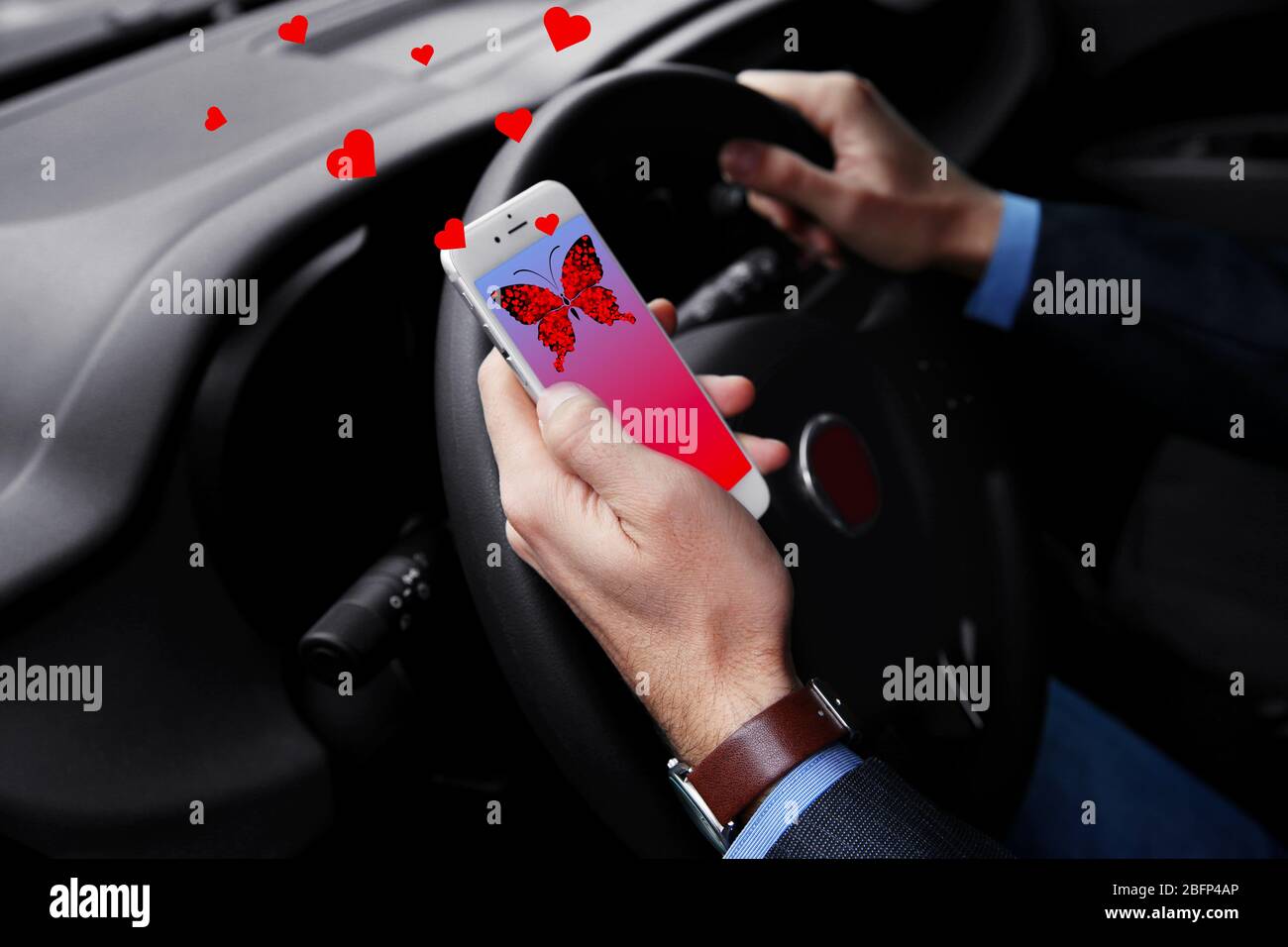 Man driver using smart phone in car Stock Photo - Alamy