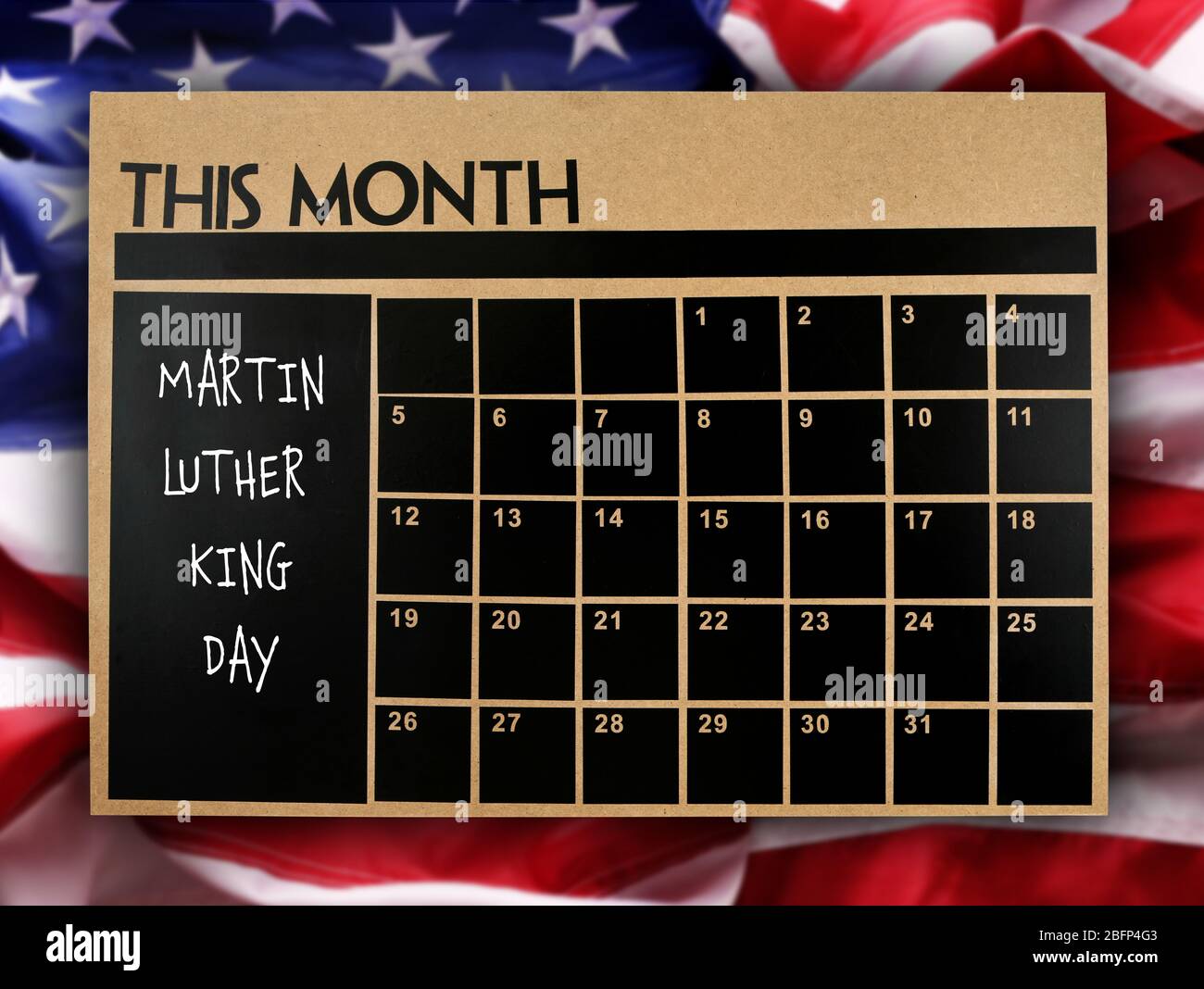 Martin Luther King Day. Chalkboard wall calendar on Flag of United ...
