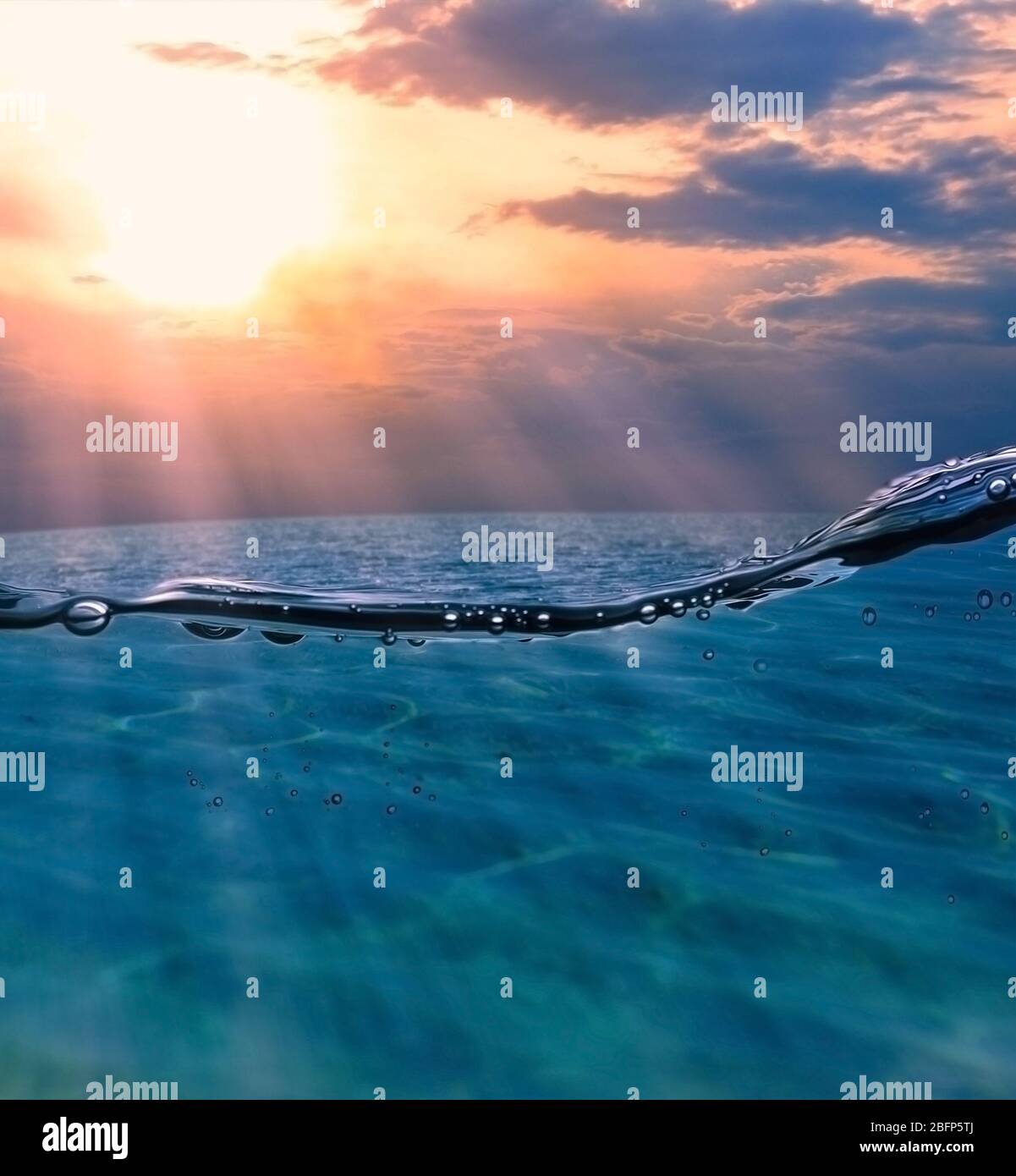 Beautiful seascape background. Sun light underwater Stock Photo - Alamy