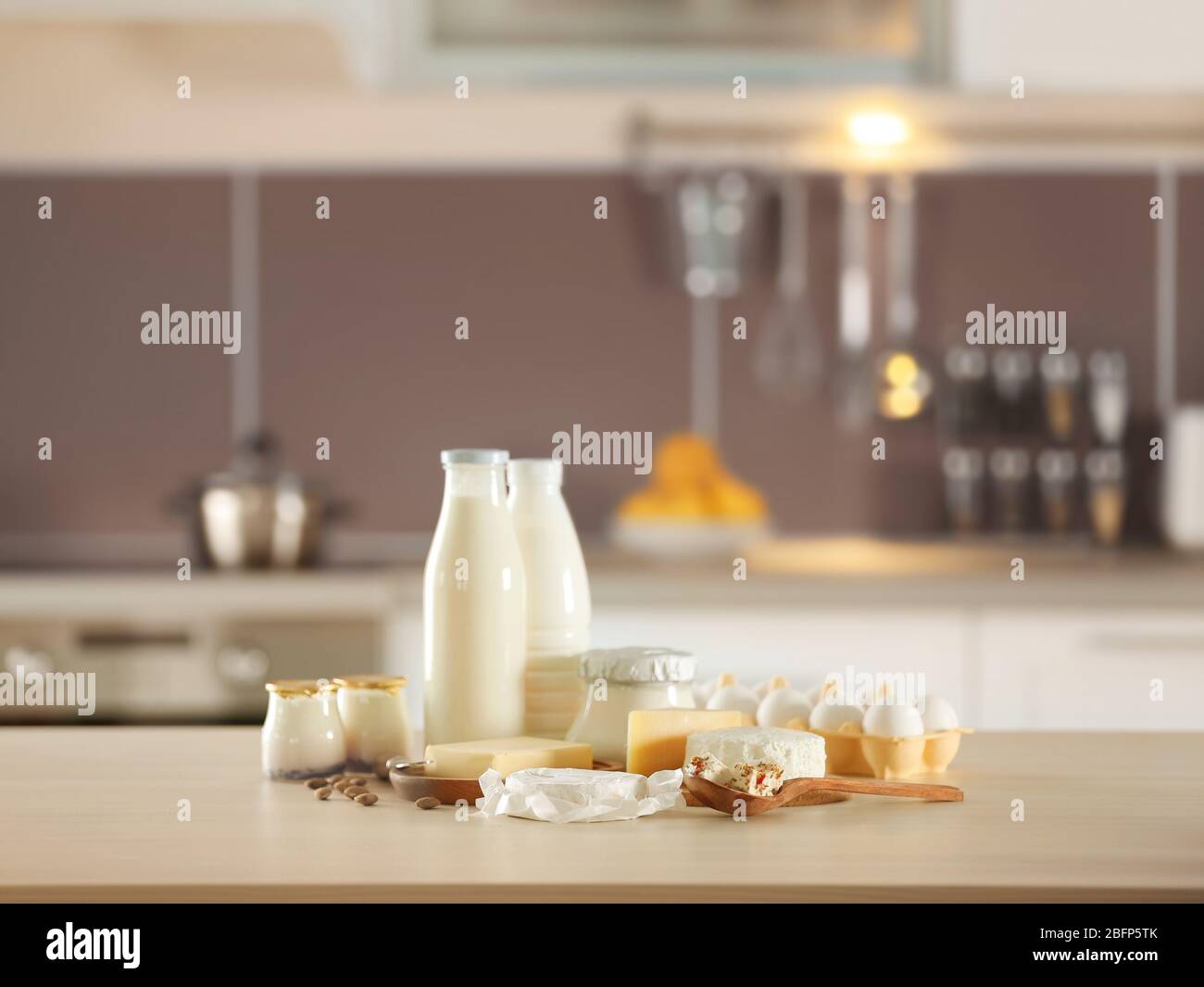 Dairy products on kitchen table Stock Photo - Alamy