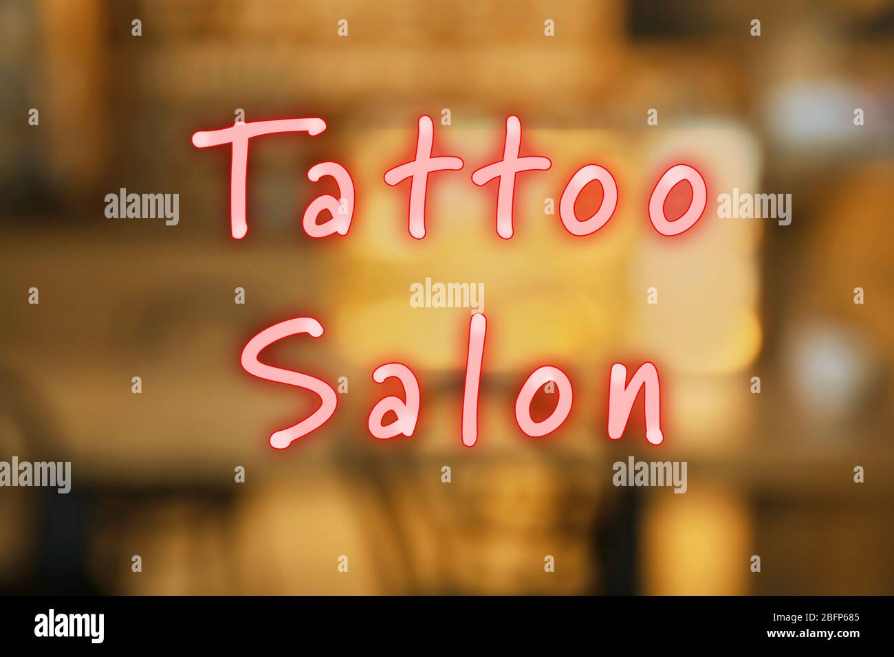 Text Tattoo Salon on blurred background Stock Photo - Alamy