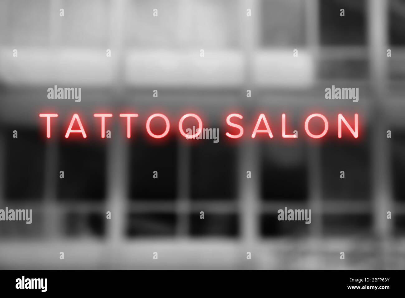 Text Tattoo Salon on blurred background Stock Photo - Alamy