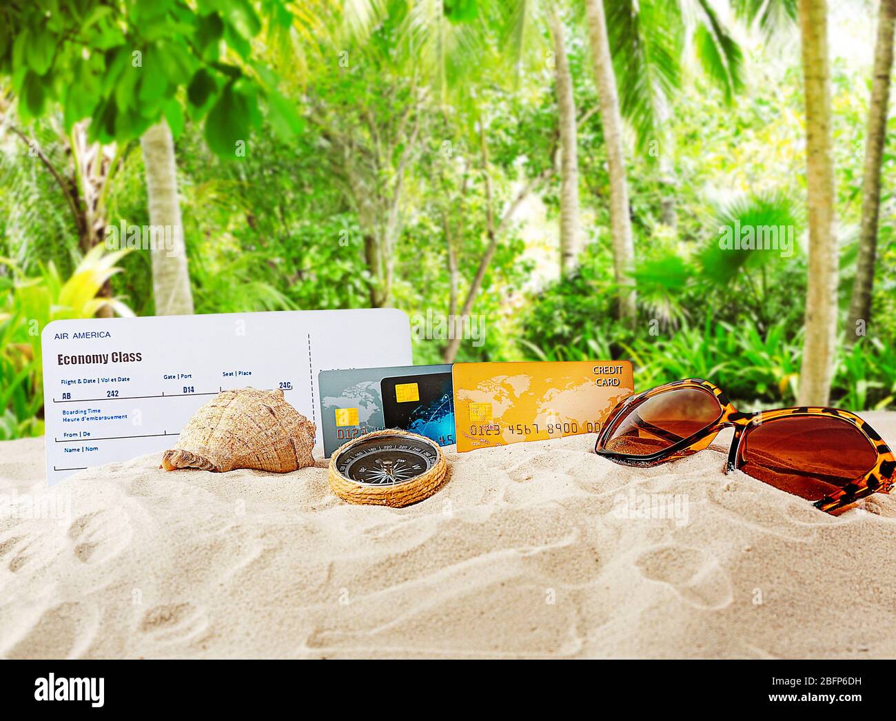 Credit cards, boarding pass and sunglasses on beach Stock Photo - Alamy