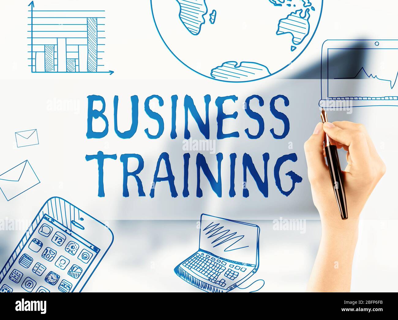 Business training concept. Female hand with pen Stock Photo - Alamy