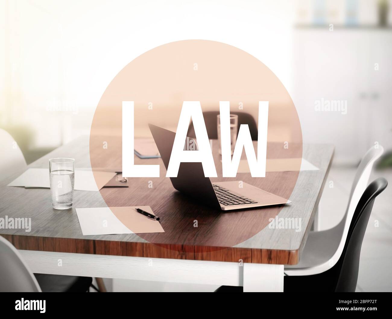 Law concept. Workplace with laptop and text design. Word law on ...