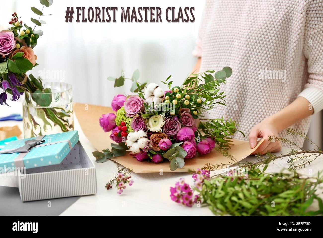 Woman making a flower bouquet Stock Photo - Alamy
