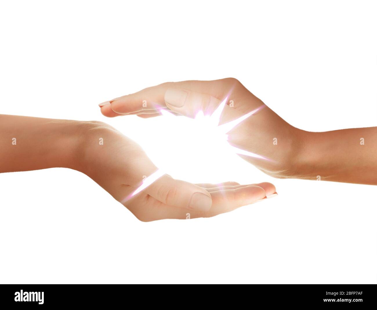 Female hands holding light on white background Stock Photo - Alamy