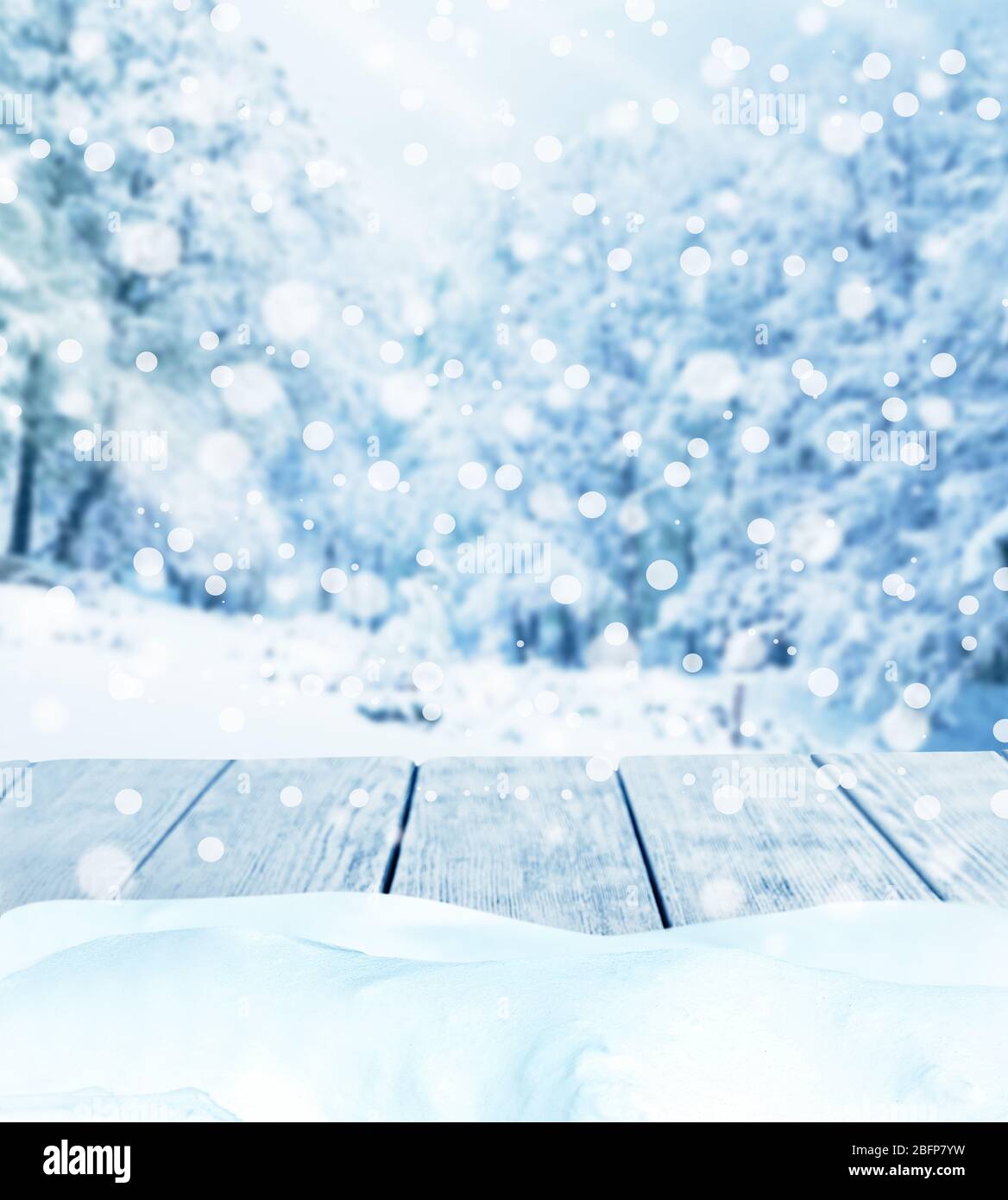 Wooden board on beautiful winter landscape Stock Photo - Alamy