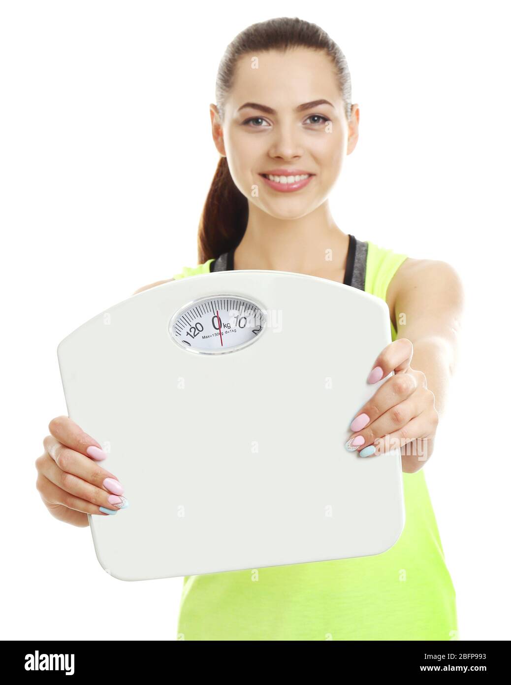 Young beautiful woman with scales on white background Stock Photo - Alamy