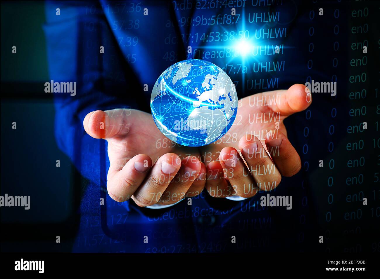 Businessman holding digital earth in hands. Technology concept Stock ...