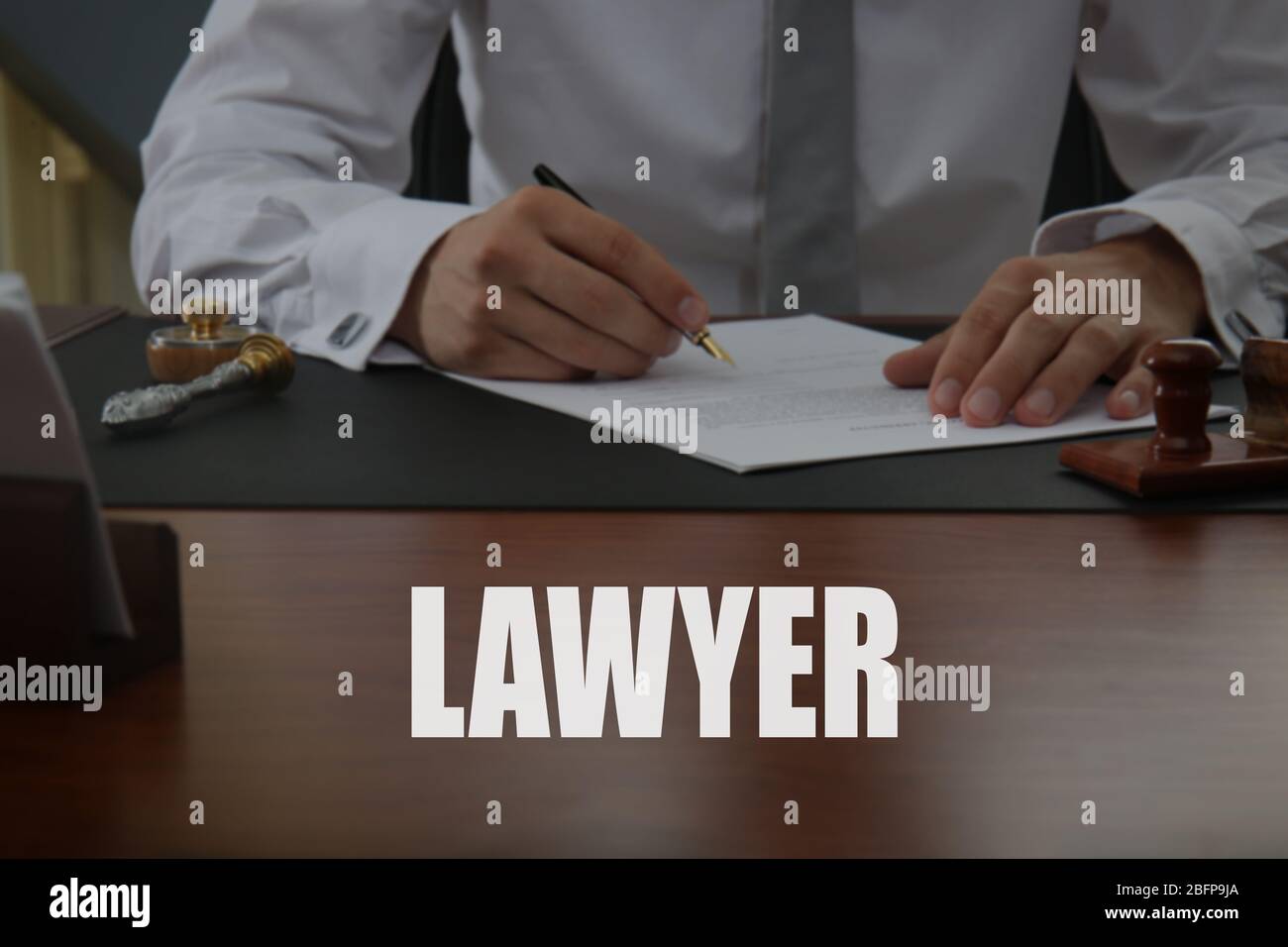 LAWYER. Notary public signing document in office Stock Photo - Alamy