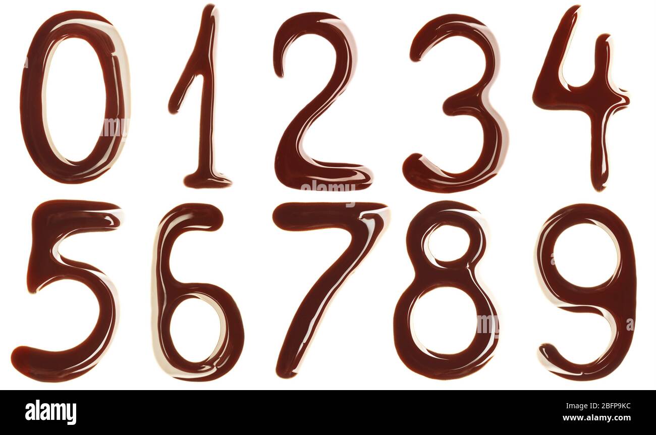 Chocolate numbers on white background Stock Photo - Alamy