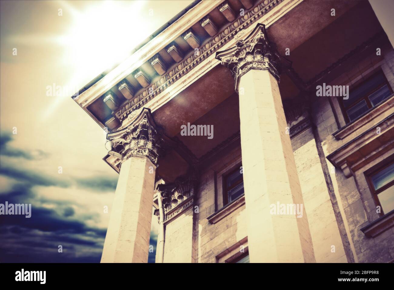 Pillars of courthouse in retro style Stock Photo - Alamy