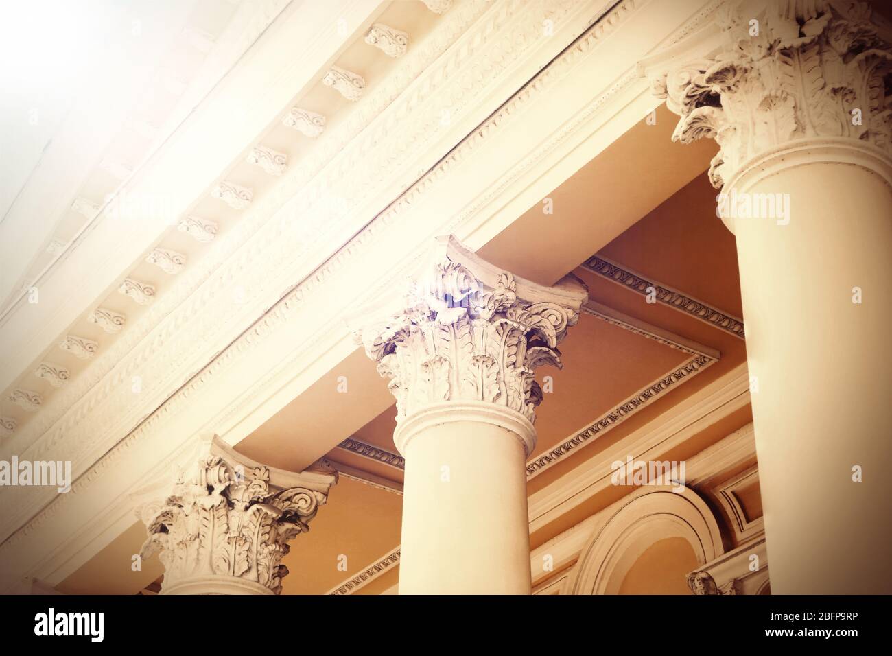 Pillars of courthouse in retro style Stock Photo - Alamy