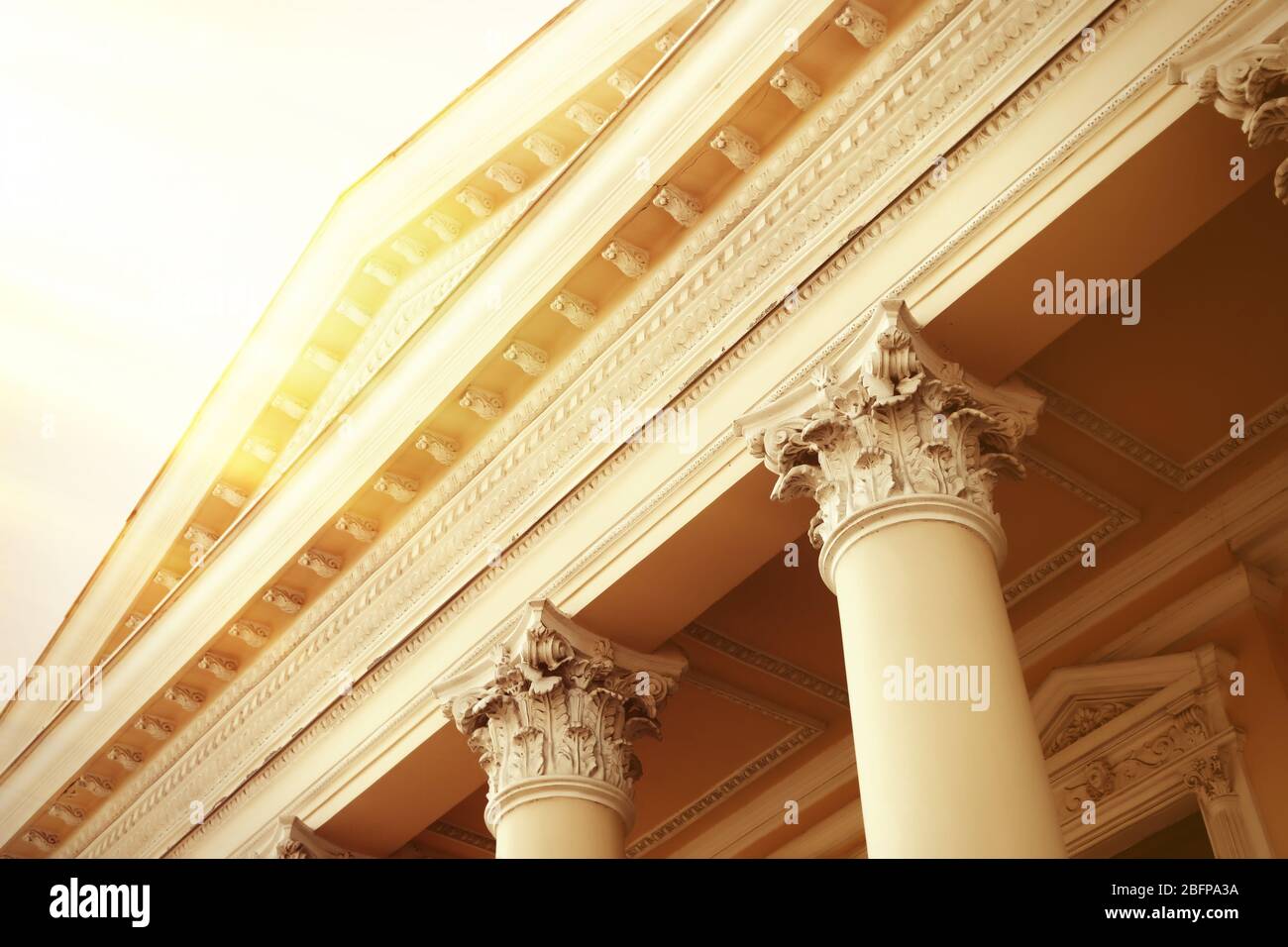 Pillars of courthouse in retro style Stock Photo - Alamy