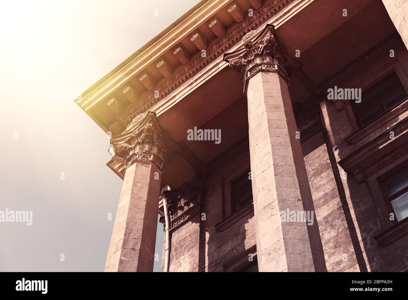 Pillars of courthouse in retro style Stock Photo - Alamy