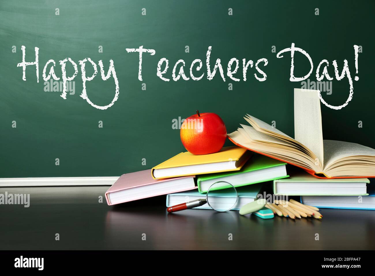 Teachers day concept. Text on chalkboard Stock Photo - Alamy