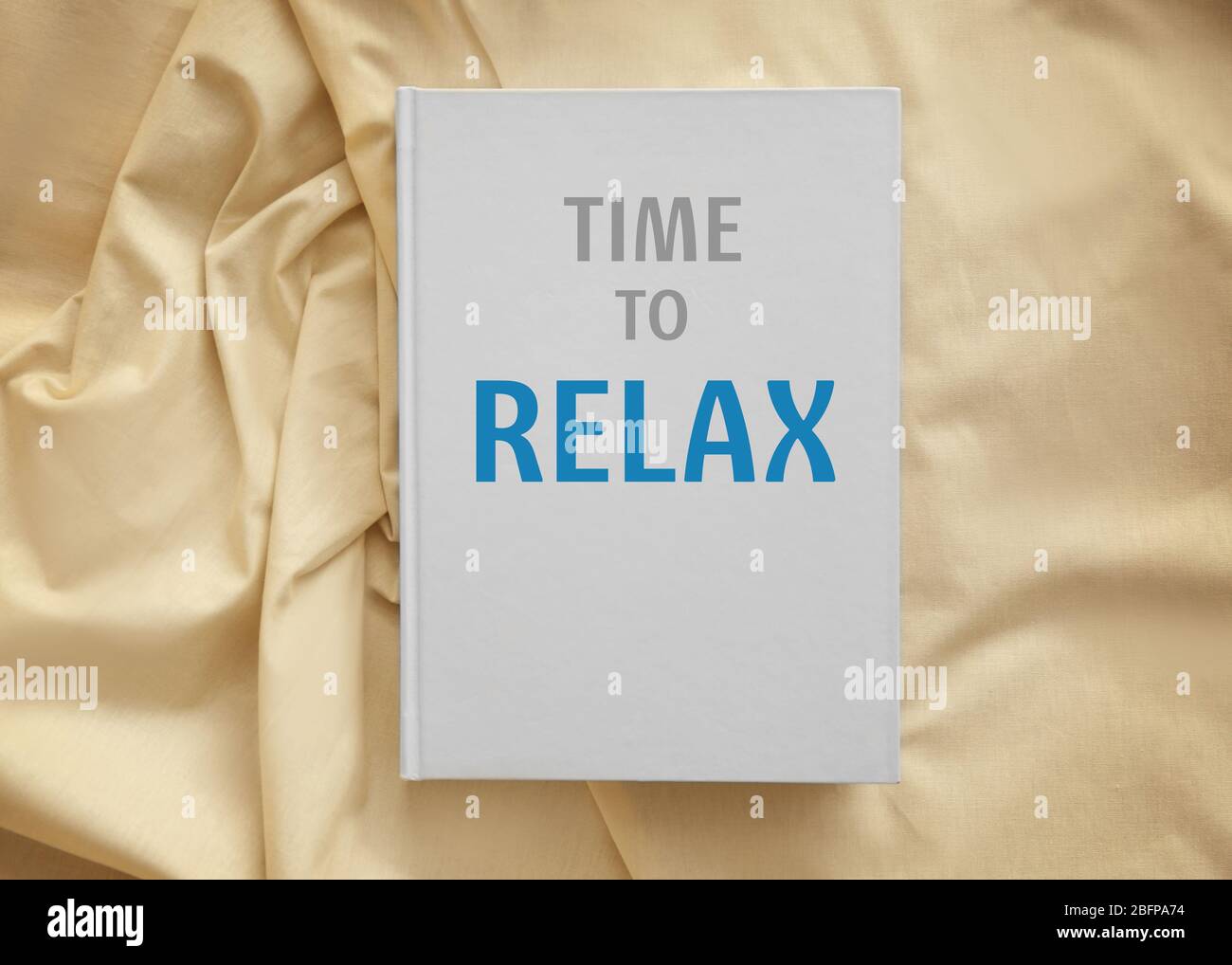Text TIME TO RELAX on white book cover. Leisure concept Stock Photo - Alamy