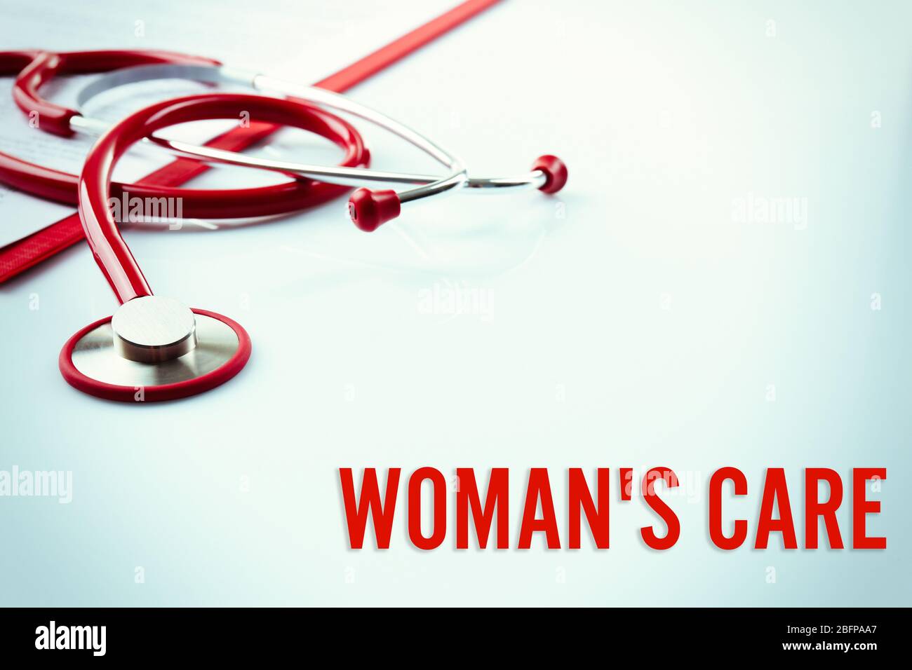 Gynecology concept. Red stethoscope on white background Stock Photo - Alamy