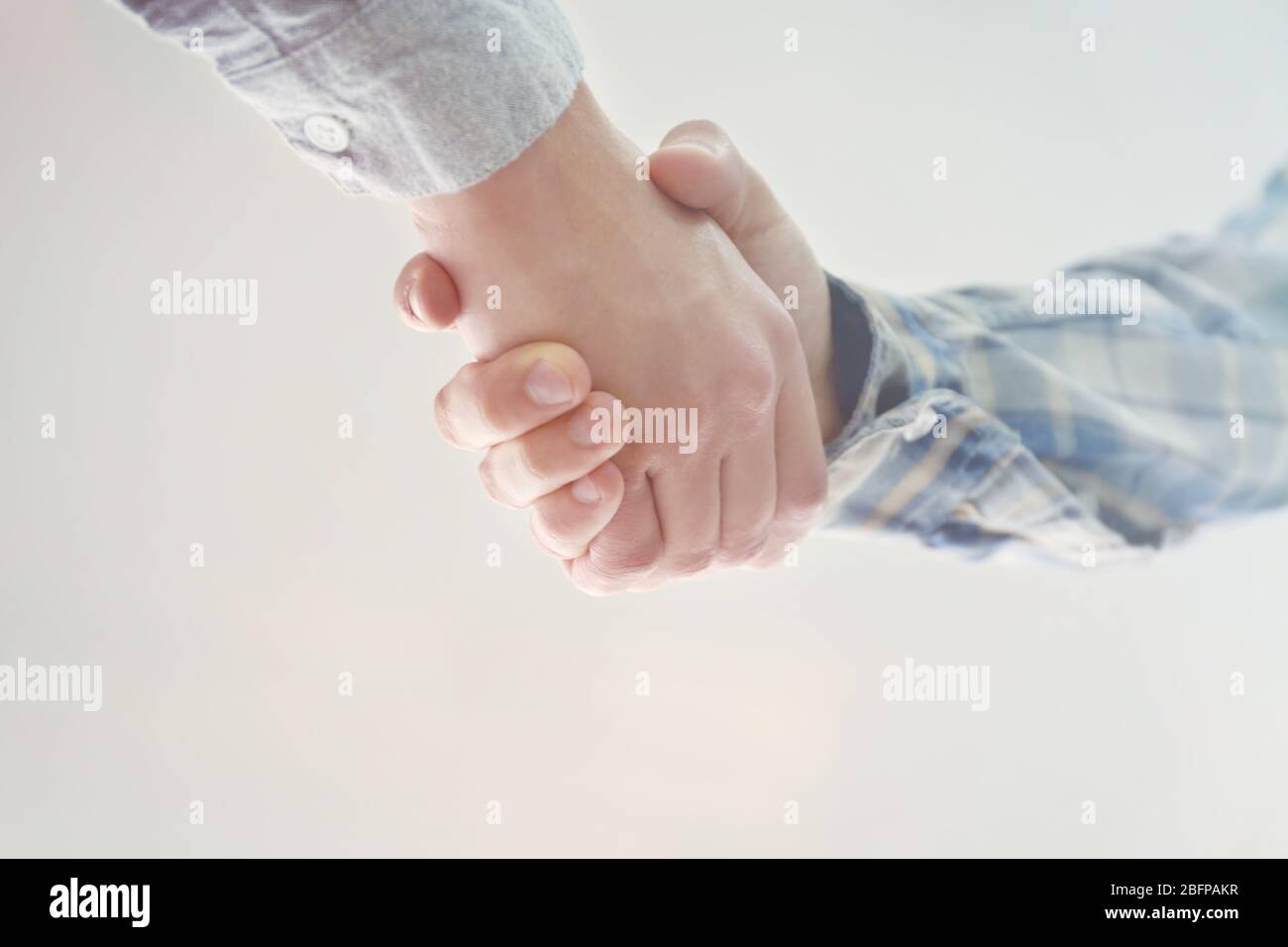 Man shaking hand on top hi-res stock photography and images - Alamy