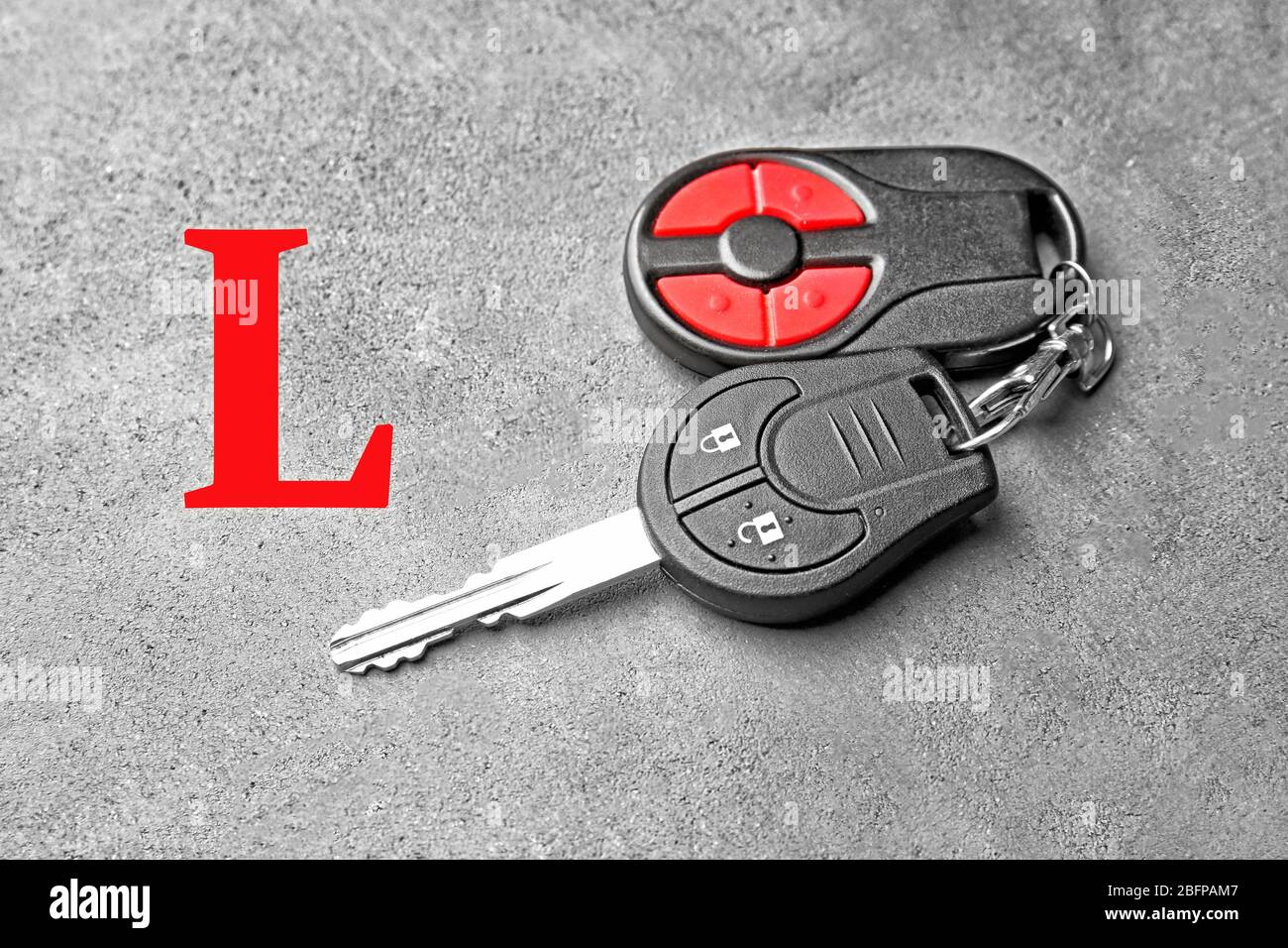 Learner driver. Car key on table Stock Photo - Alamy