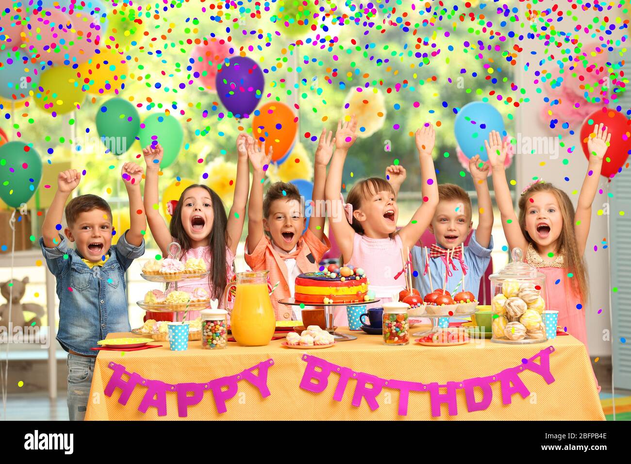 Children's birthday party in decorated room Stock Photo - Alamy