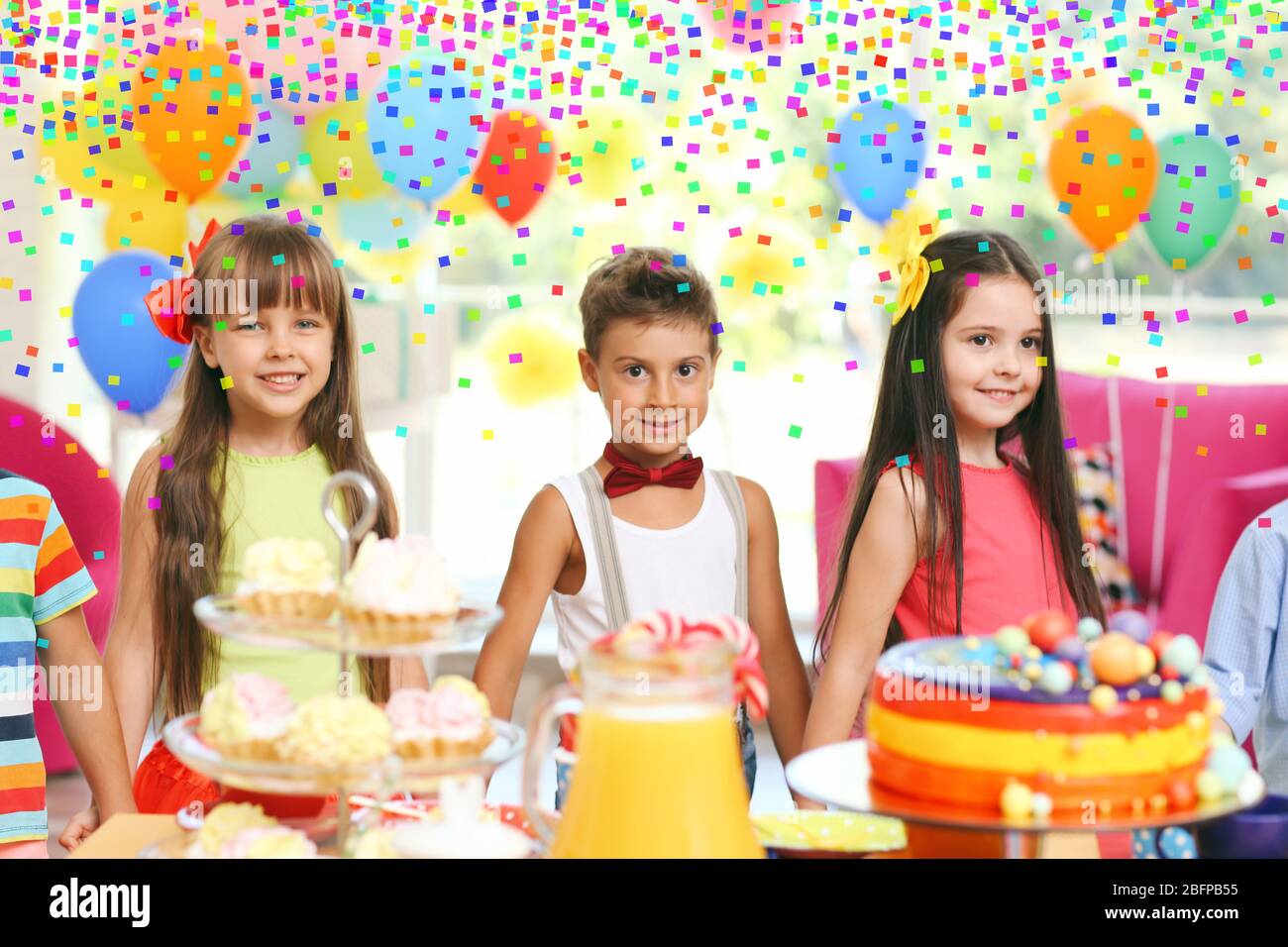 Children's funny birthday party in decorated room Stock Photo - Alamy