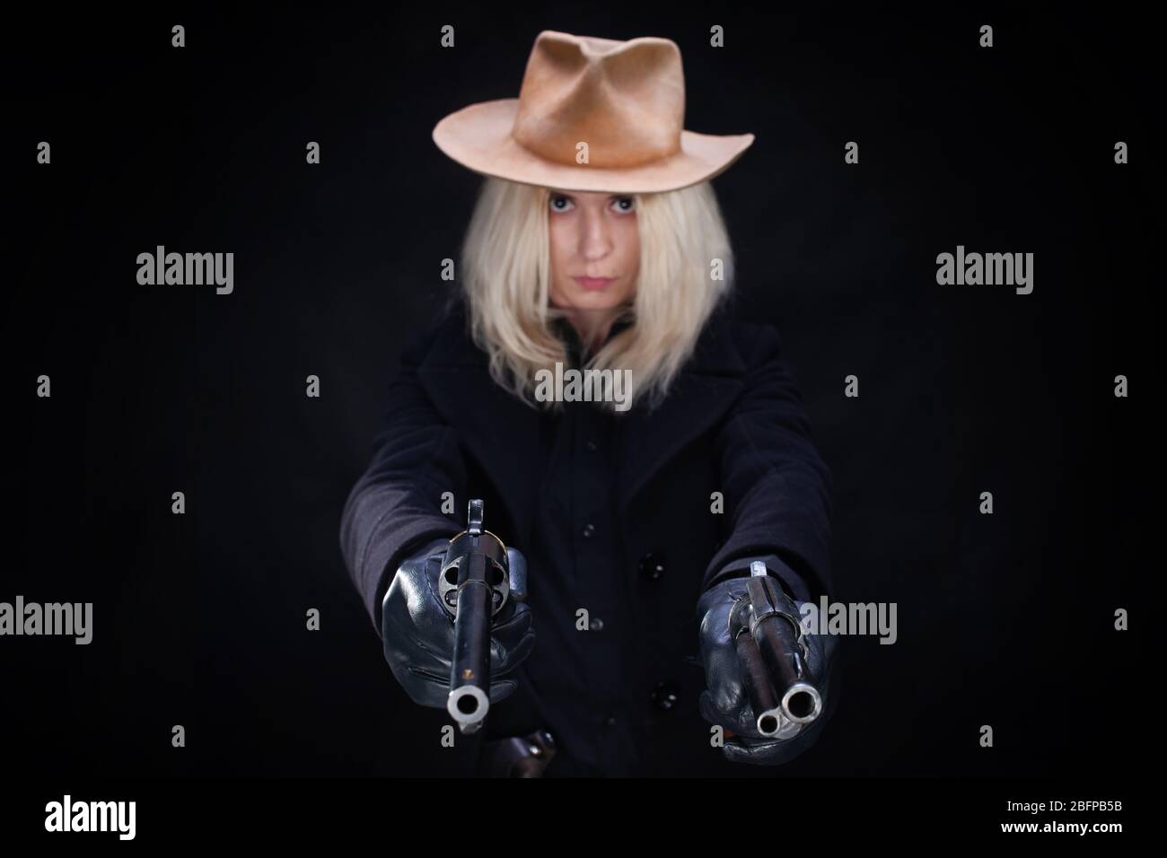 Vintage cowgirl with gun hi-res stock photography and images - Alamy