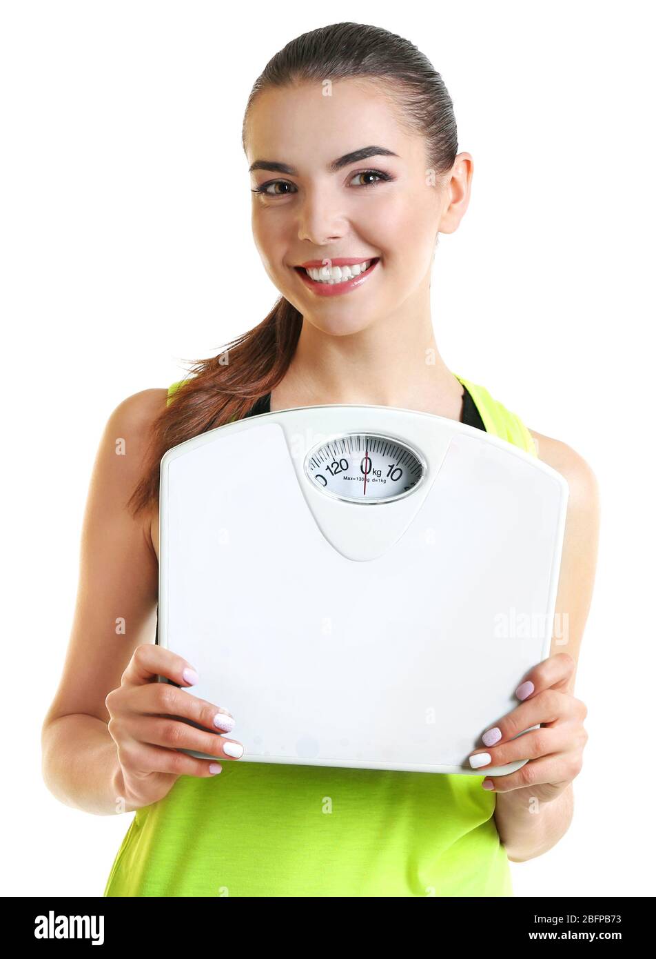 Young beautiful woman with scales on white background Stock Photo - Alamy