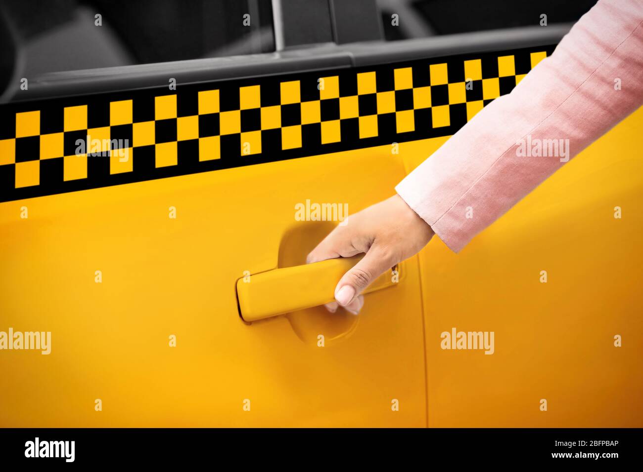Taxi. Female hand opening car door, close up Stock Photo - Alamy
