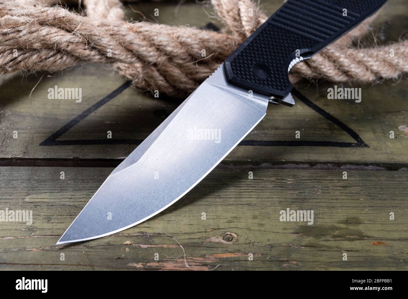 Blade of a knife at an angle close up. Macro photo of a knife blade ...