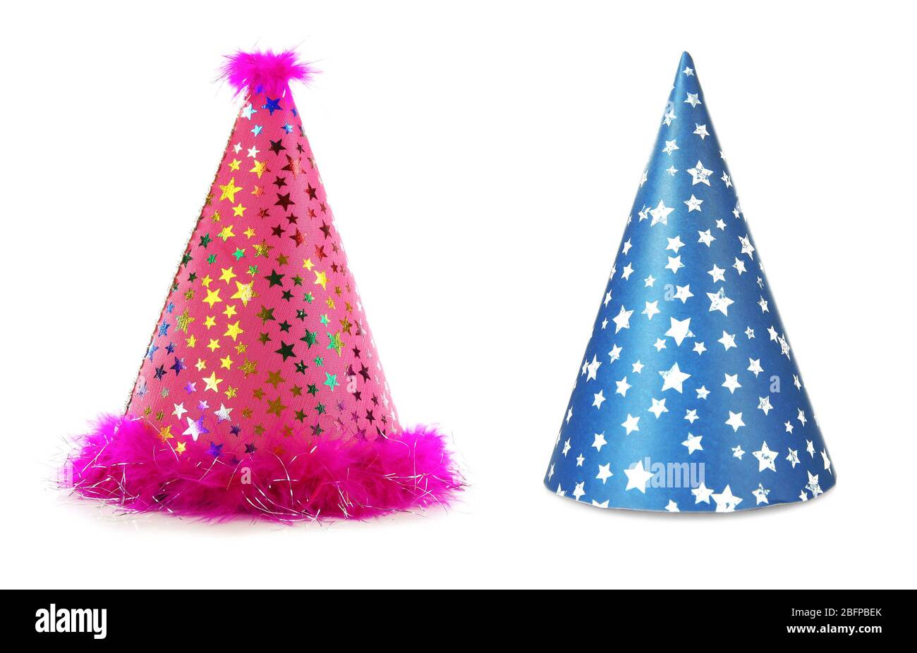 Colorful party caps on white background Stock Photo - Alamy