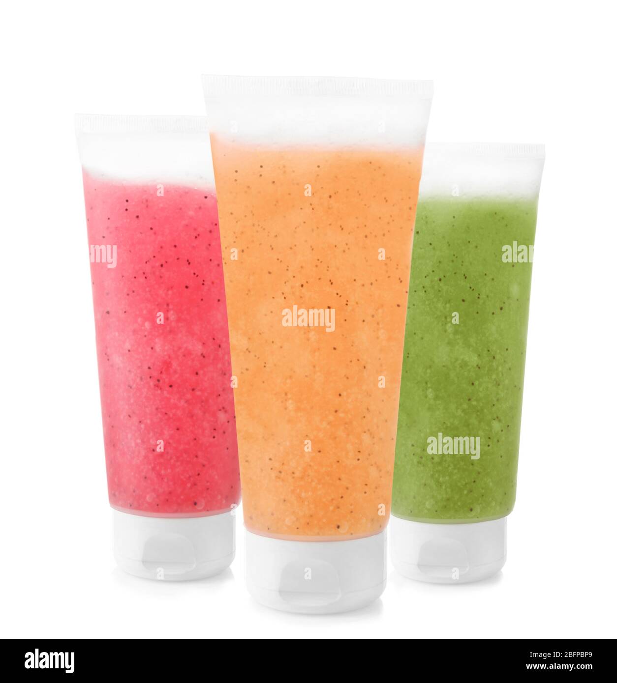 Tubes of natural scrub on white background Stock Photo - Alamy