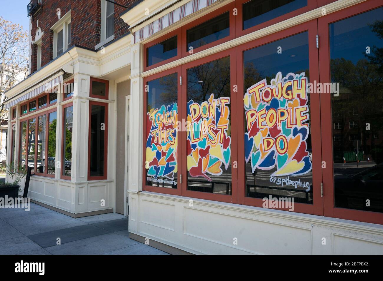 Washington, DC, USA. 19th Apr, 2020. A painted storefront window is ...
