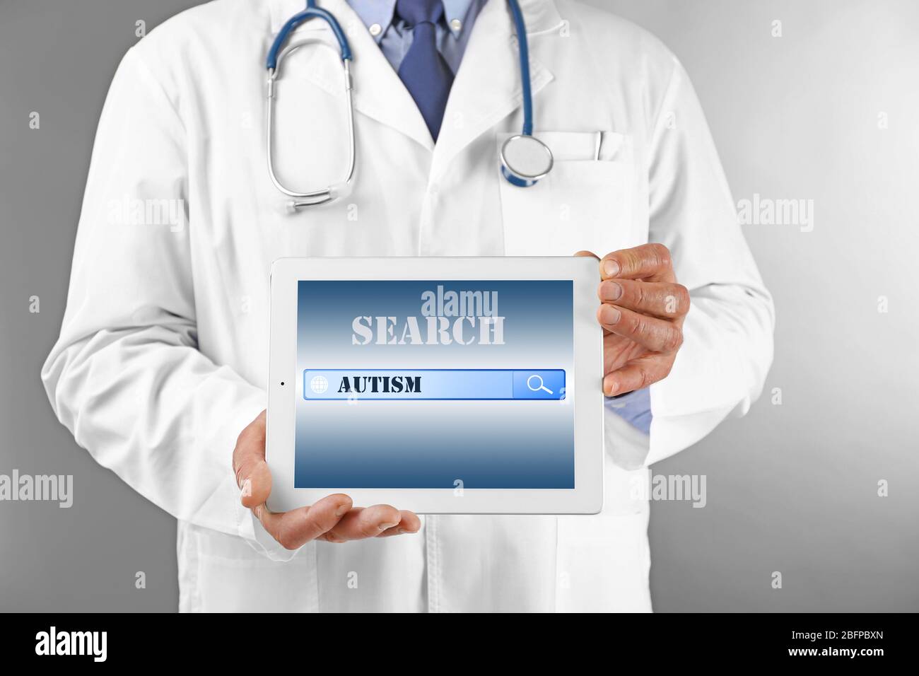 Autistic adult tablet hi-res stock photography and images - Alamy