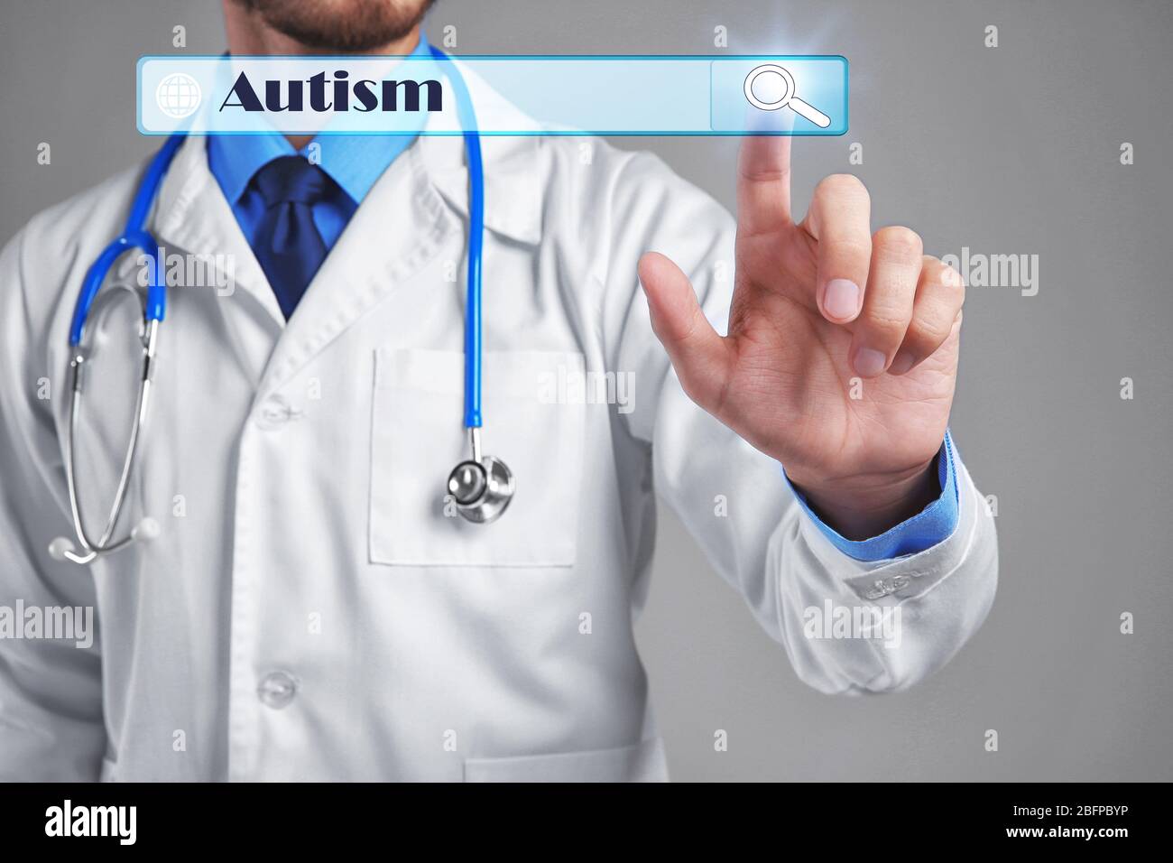 Doctor working with virtual screen. Children autism concept Stock Photo ...