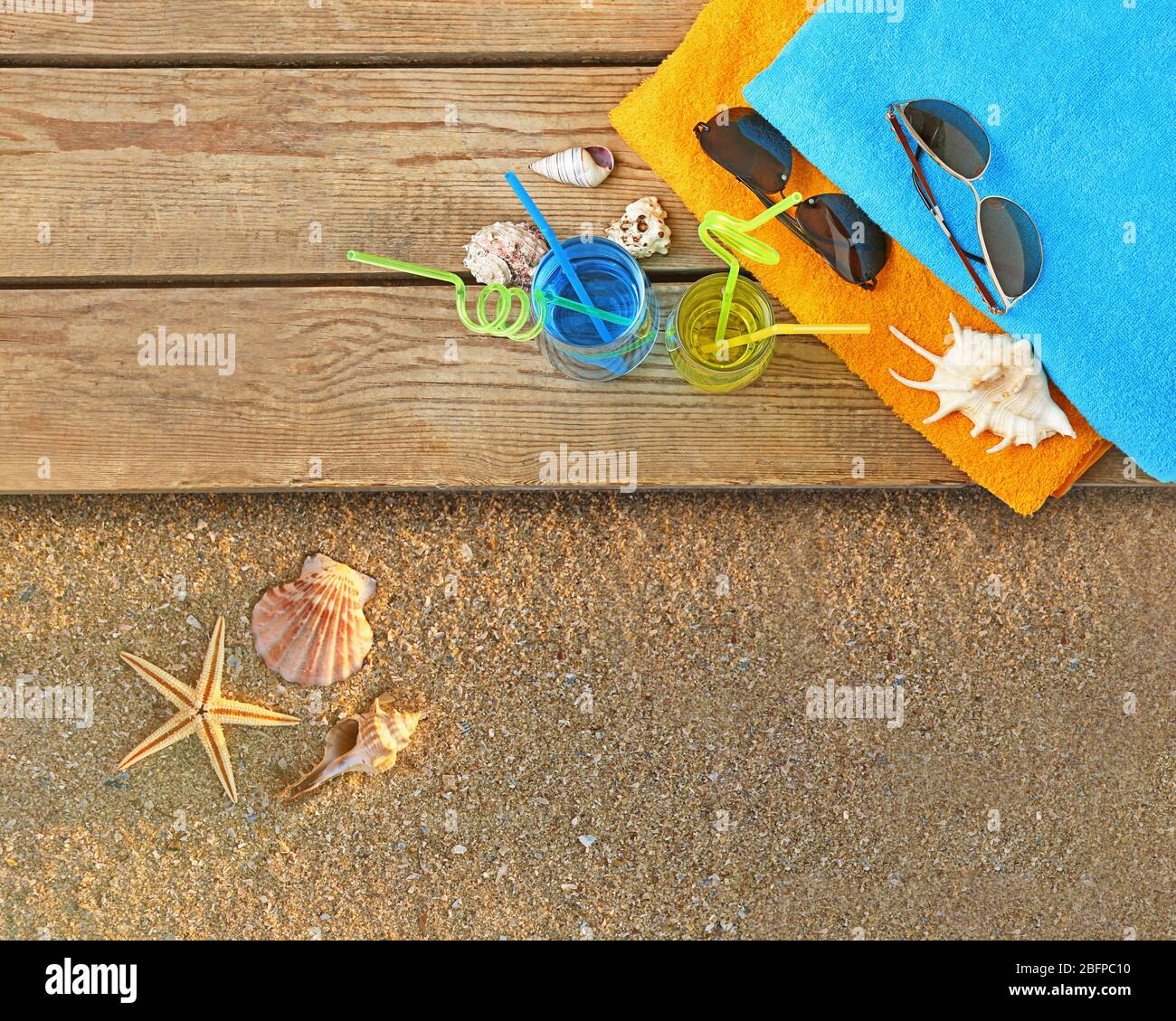 Summer beach set on sand background Stock Photo - Alamy